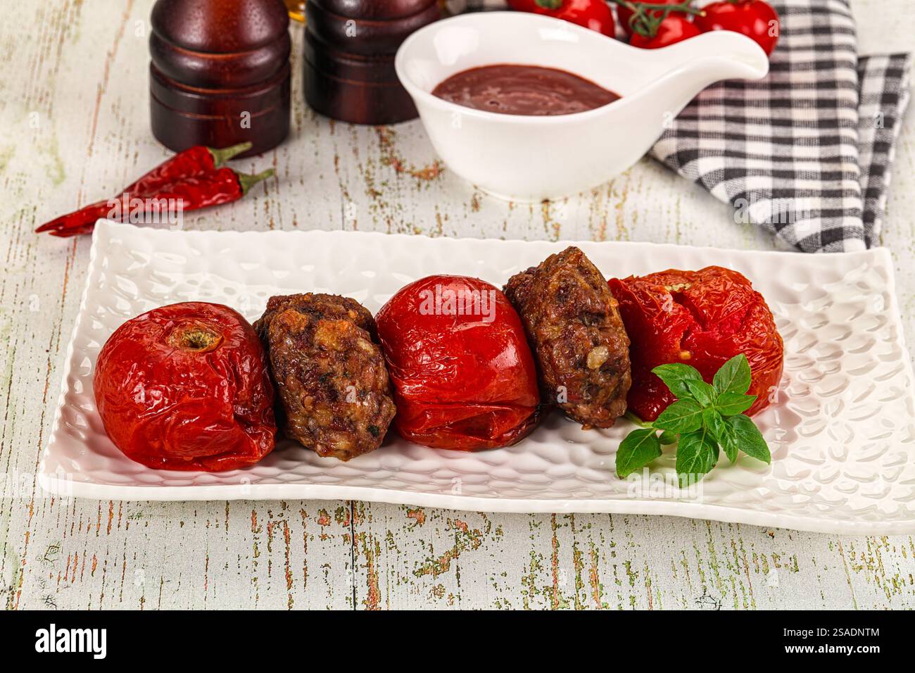 Turkish cuisine - Domatesli Kebab with minced meat and tomato Stock ...