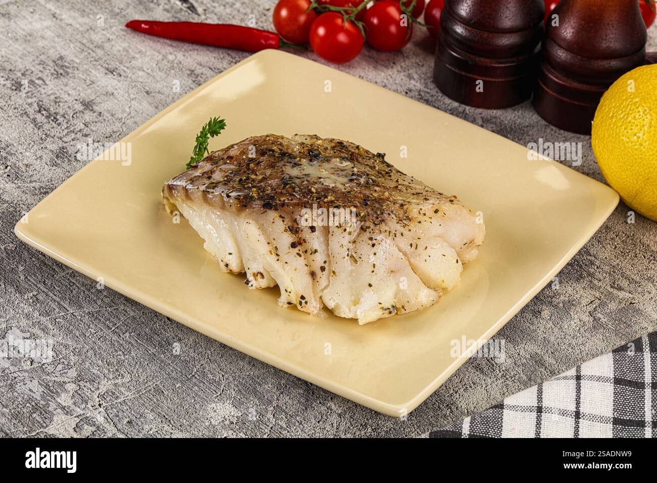 Dietary Baked cod fish fillet with spices Stock Photo - Alamy