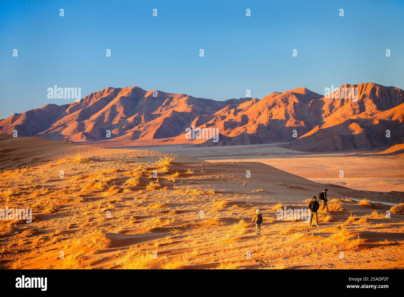 Family of father and kids enjoying stunning view over Tiras mountains ...