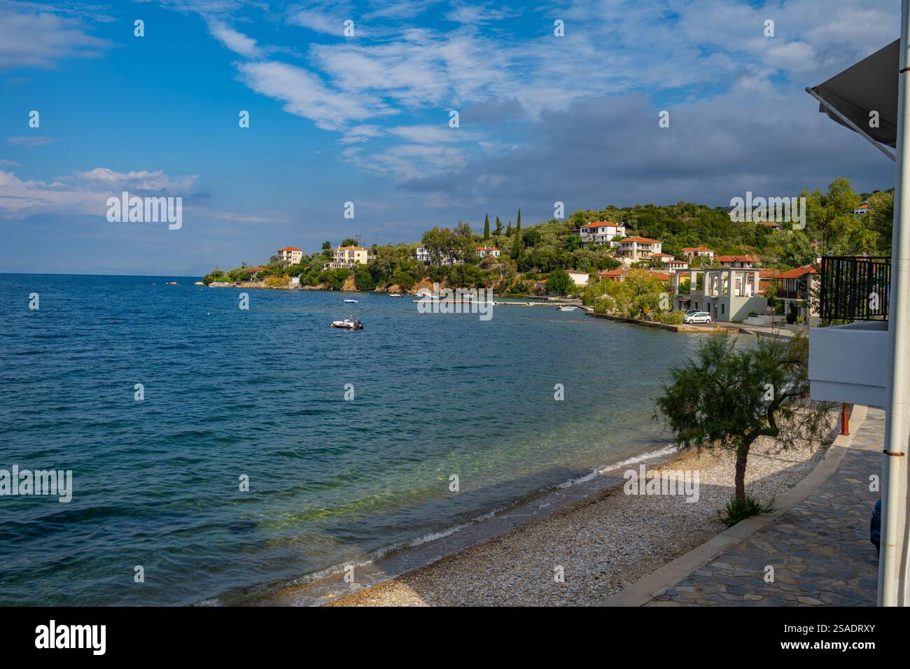 The seafront and promenade in the Village off Chorto on the west side ...