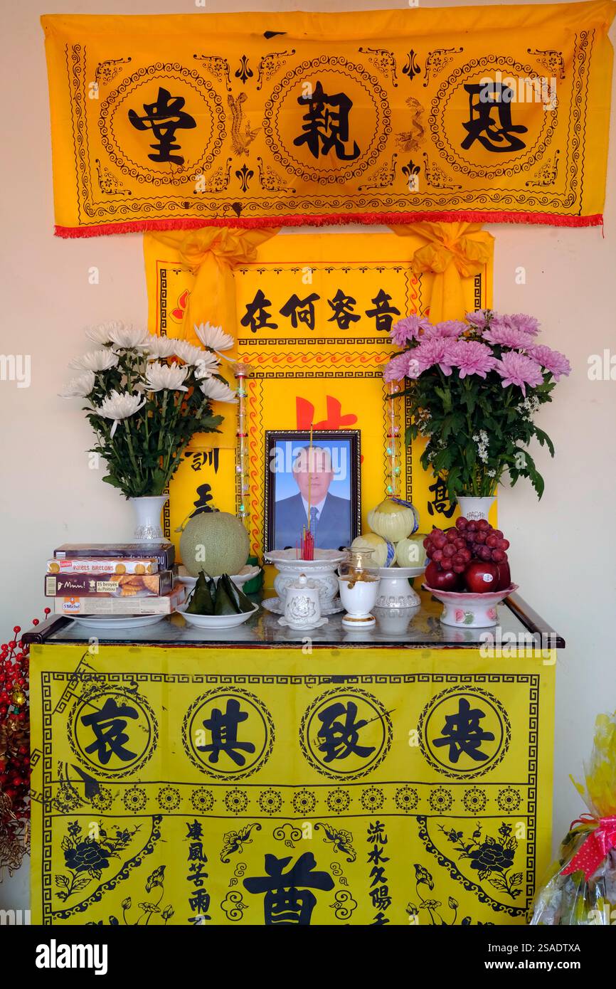 Funeral ceremony in a Buddhist family. Altar of the deceased. Tan Chau ...