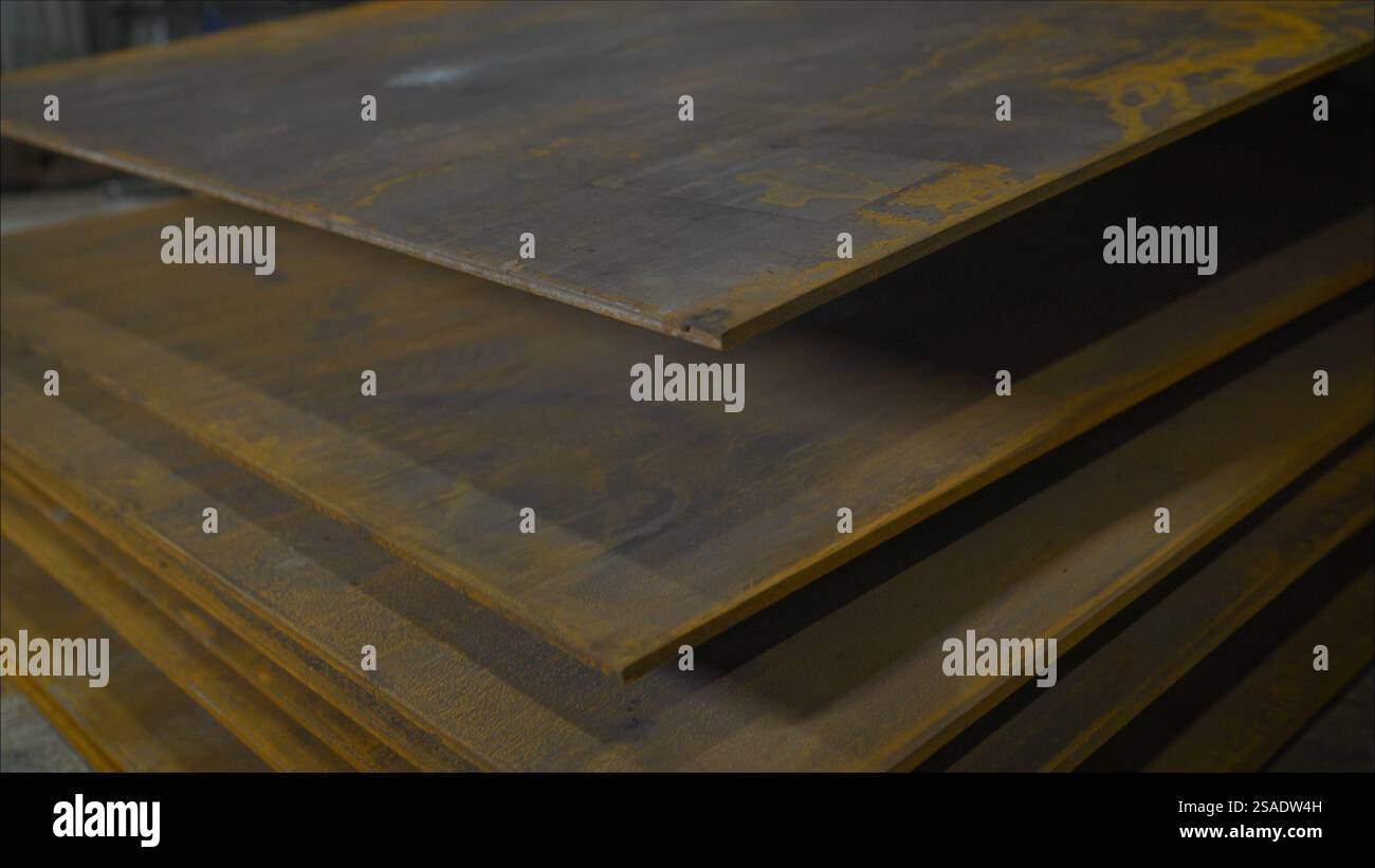 Heavy industry. Steel sheets are stacked. Thick steel sheets are at the ...