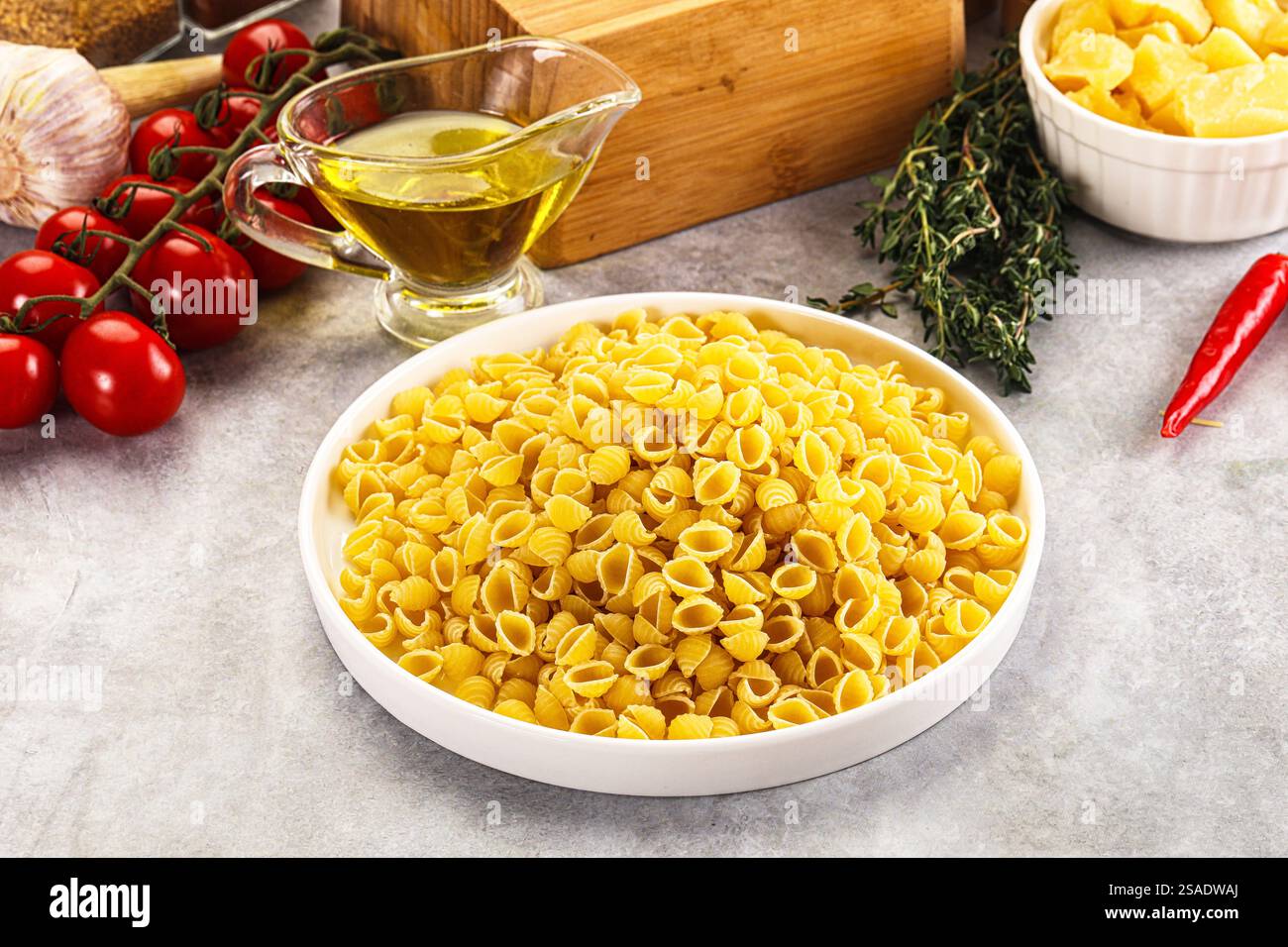 Italian cuisine - dry conchiglie shell pasta Stock Photo - Alamy