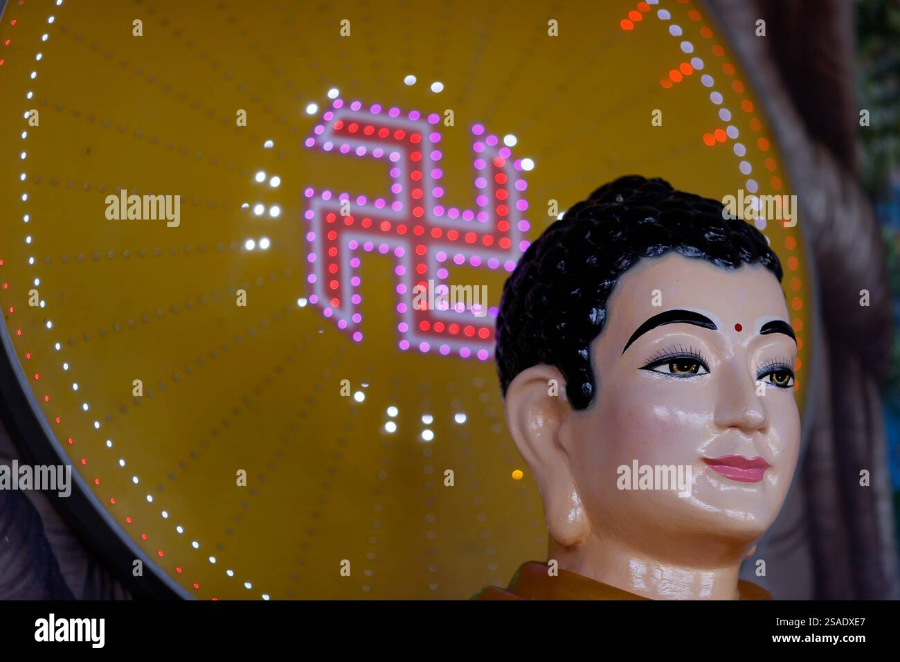 Phuoc Long Buddhist pagoda. Head of Buddha and svastika. Tan Chau ...