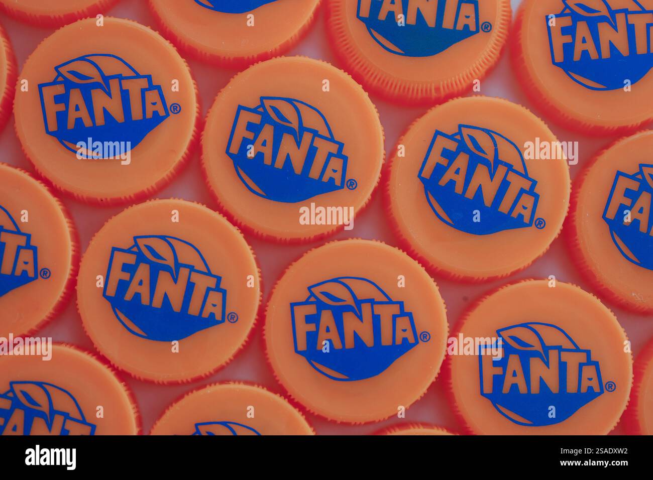 KYIV, UKRAINE - JANUARY 29, 2025 Fanta Plastic bottle caps background ...