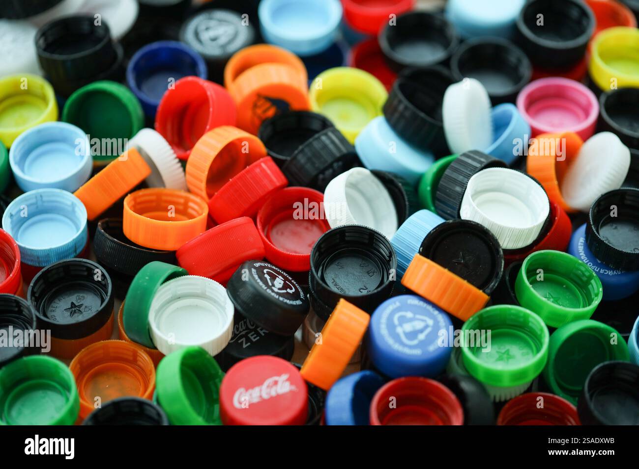 KYIV, UKRAINE - JANUARY 29, 2025 Plastic bottle caps background. Cap ...