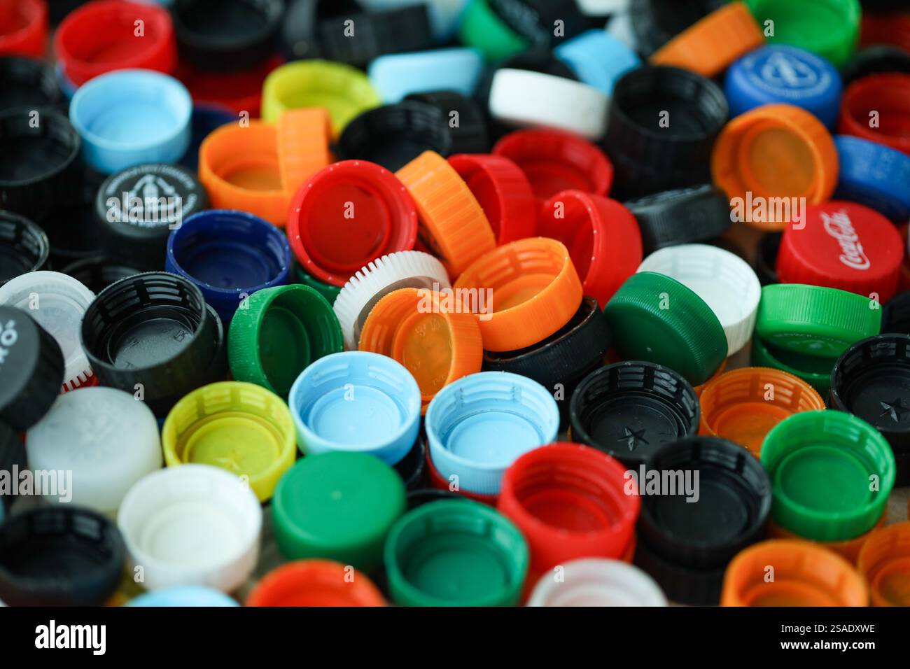 KYIV, UKRAINE - JANUARY 29, 2025 Plastic bottle caps background. Cap ...