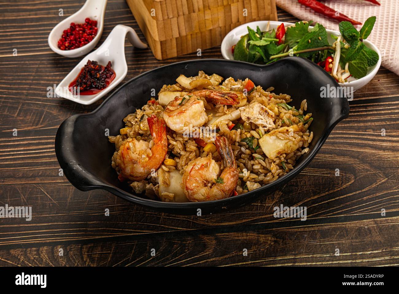 Vietnamese traditional fried rice with prawn and squid - Kom Ran Stock ...