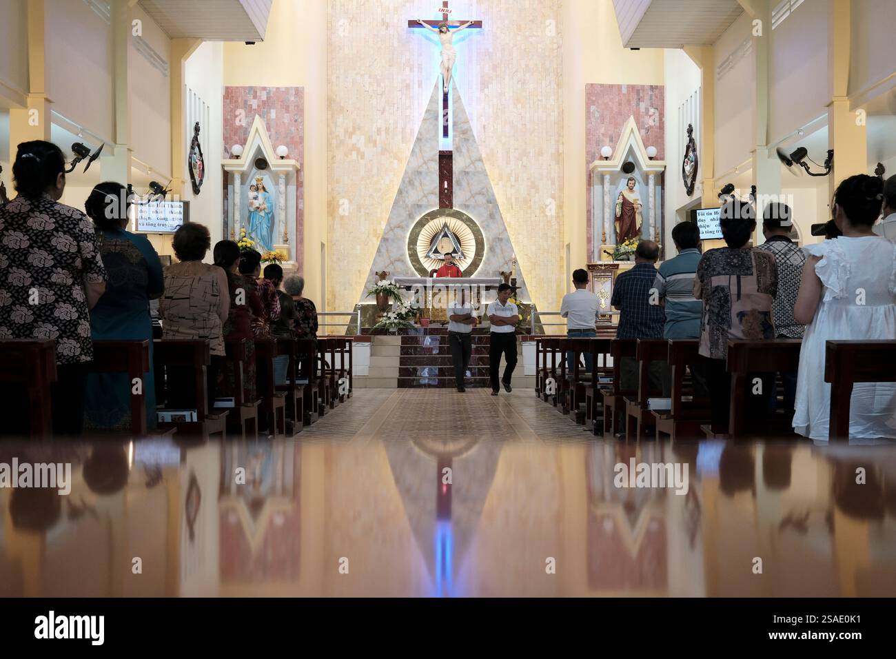 Sunday mass in a catholic church. Tan Chau. Vietnam Stock Photo - Alamy