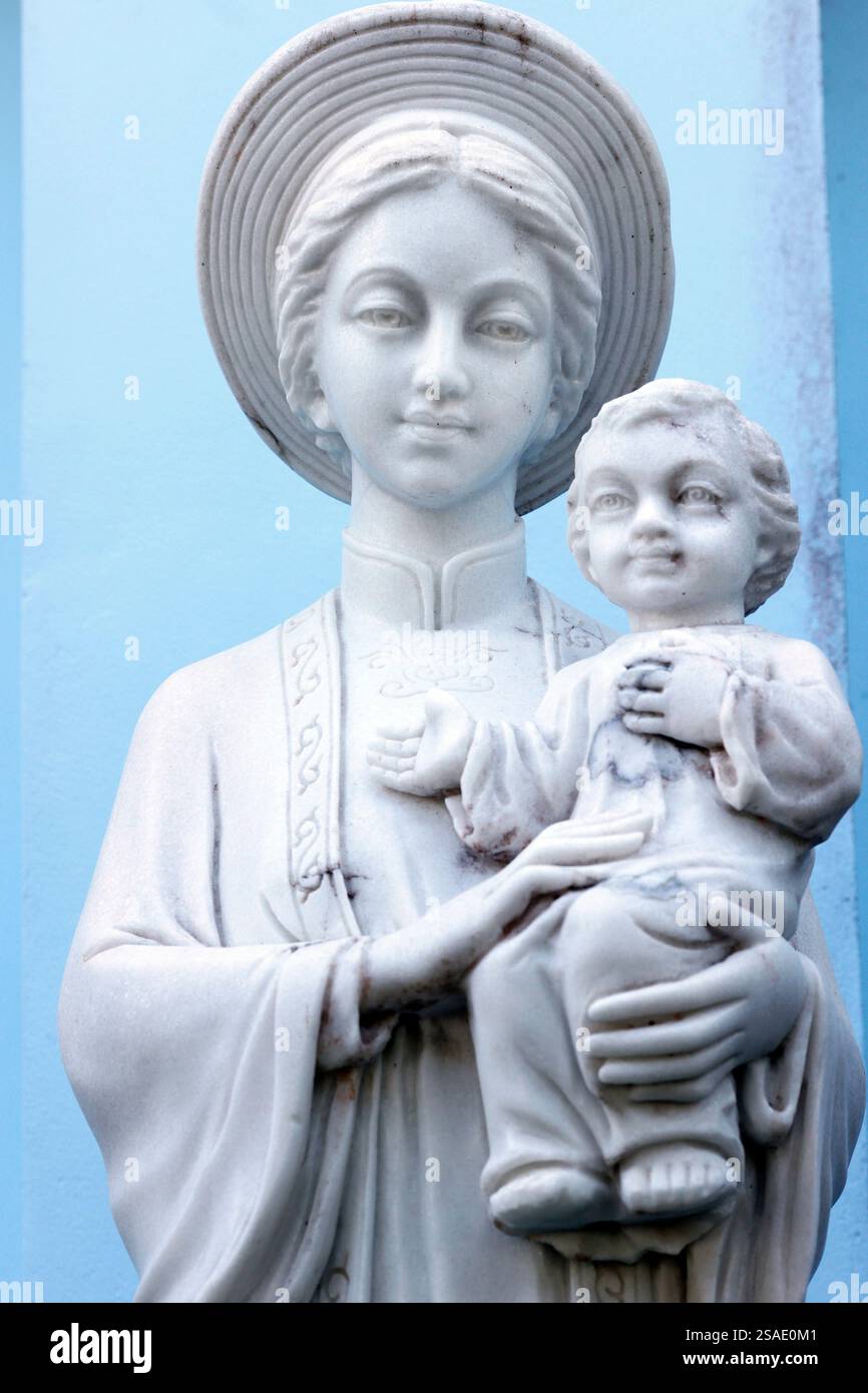 Basilica of Our Lady of La Vang. Our Lady of La Vang holding a figure ...