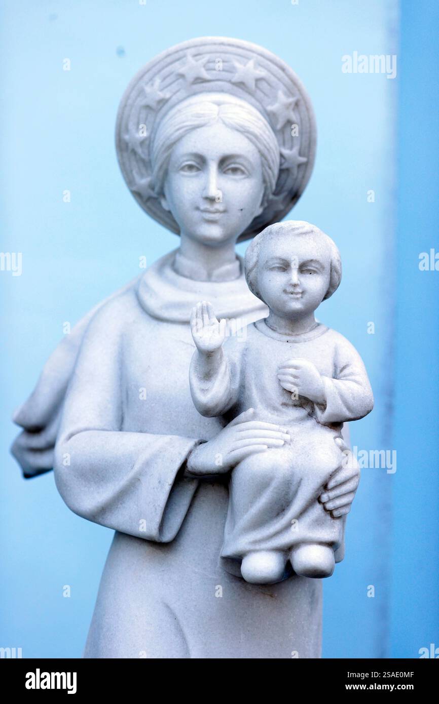 Basilica of Our Lady of La Vang. Our Lady of La Vang holding a figure ...
