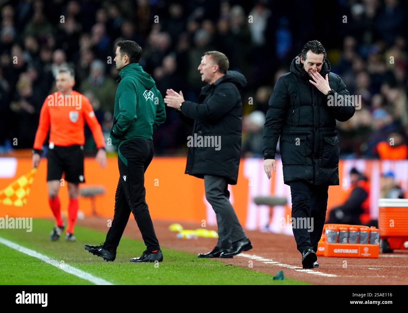 Aston Villa manager Unai Emery (right) dejected after conceding the ...