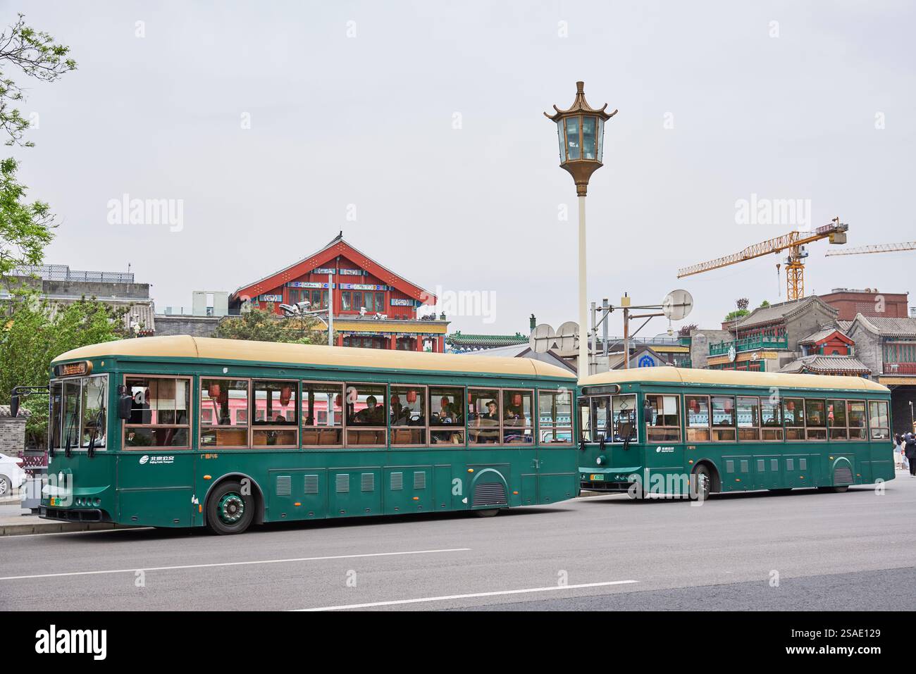 Tourist buses in front of the historic Qianmen pedestrian street south ...