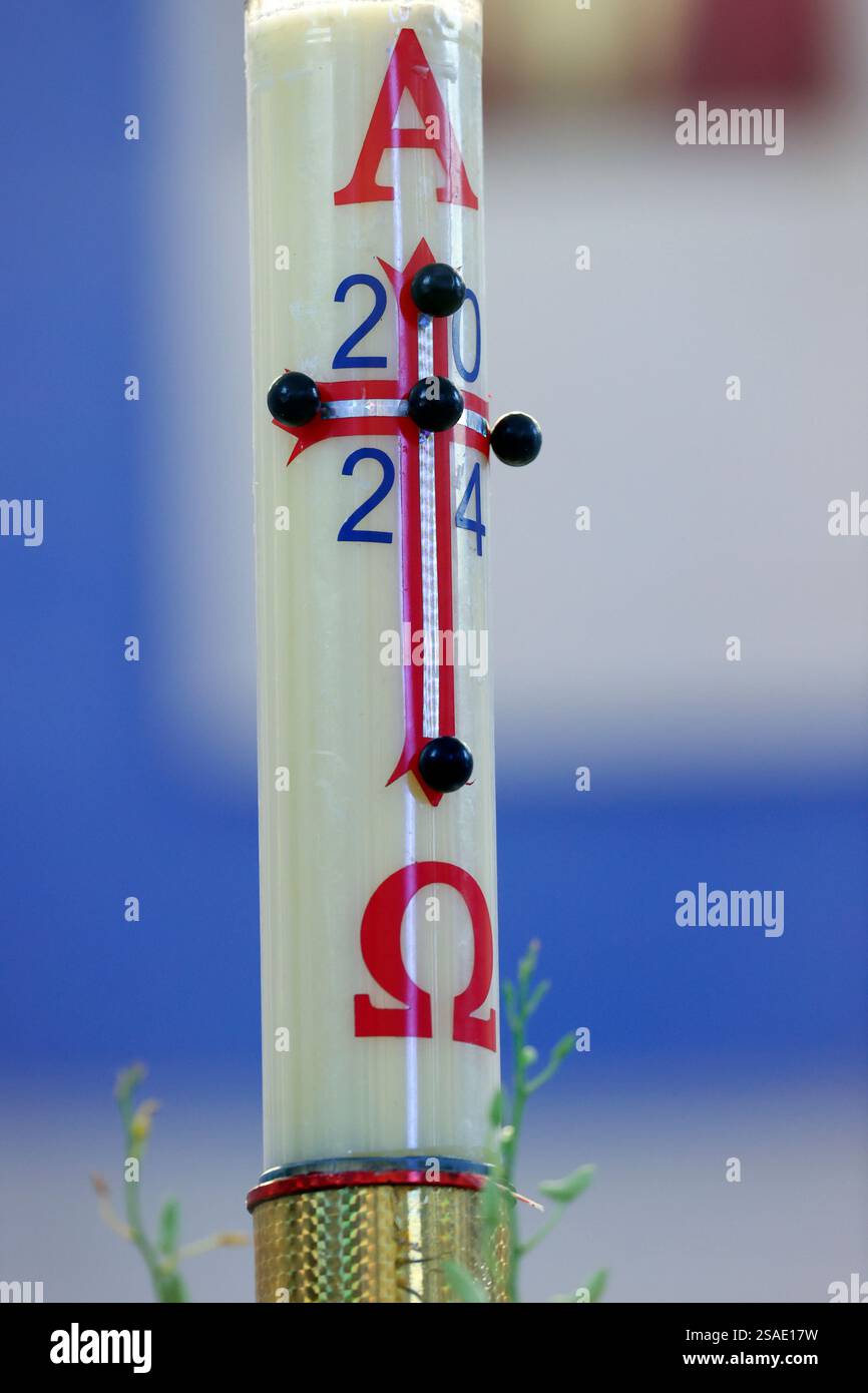 The Redeemer Church (or Notre Dame Cathedral). Easter candle or Paschal ...