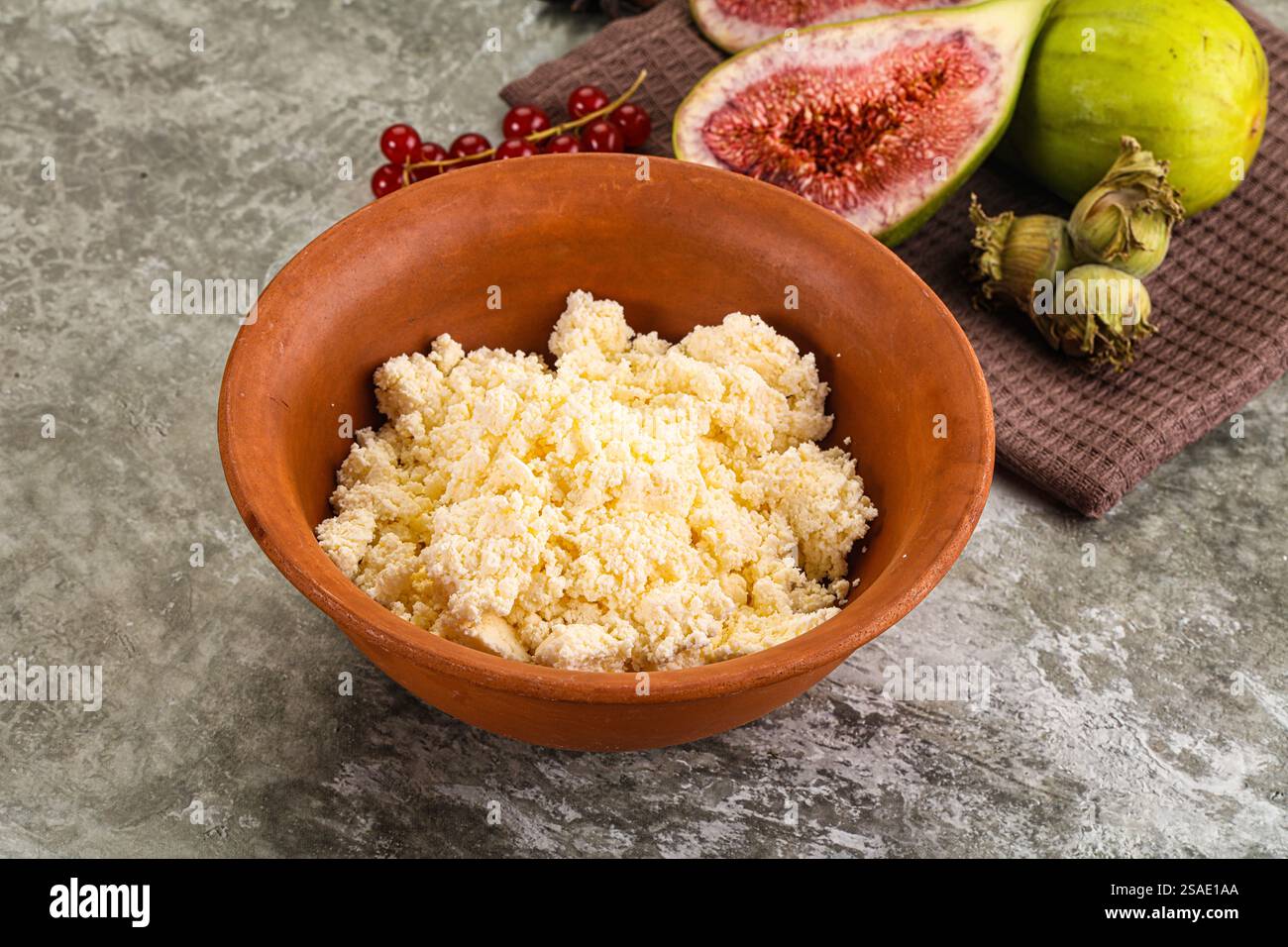 Delicous sheep cottage cheese curd served fig Stock Photo - Alamy