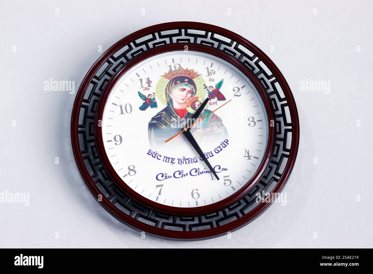 Clock with the Virgin Mary. Bac Lieu. Vietnam Stock Photo - Alamy