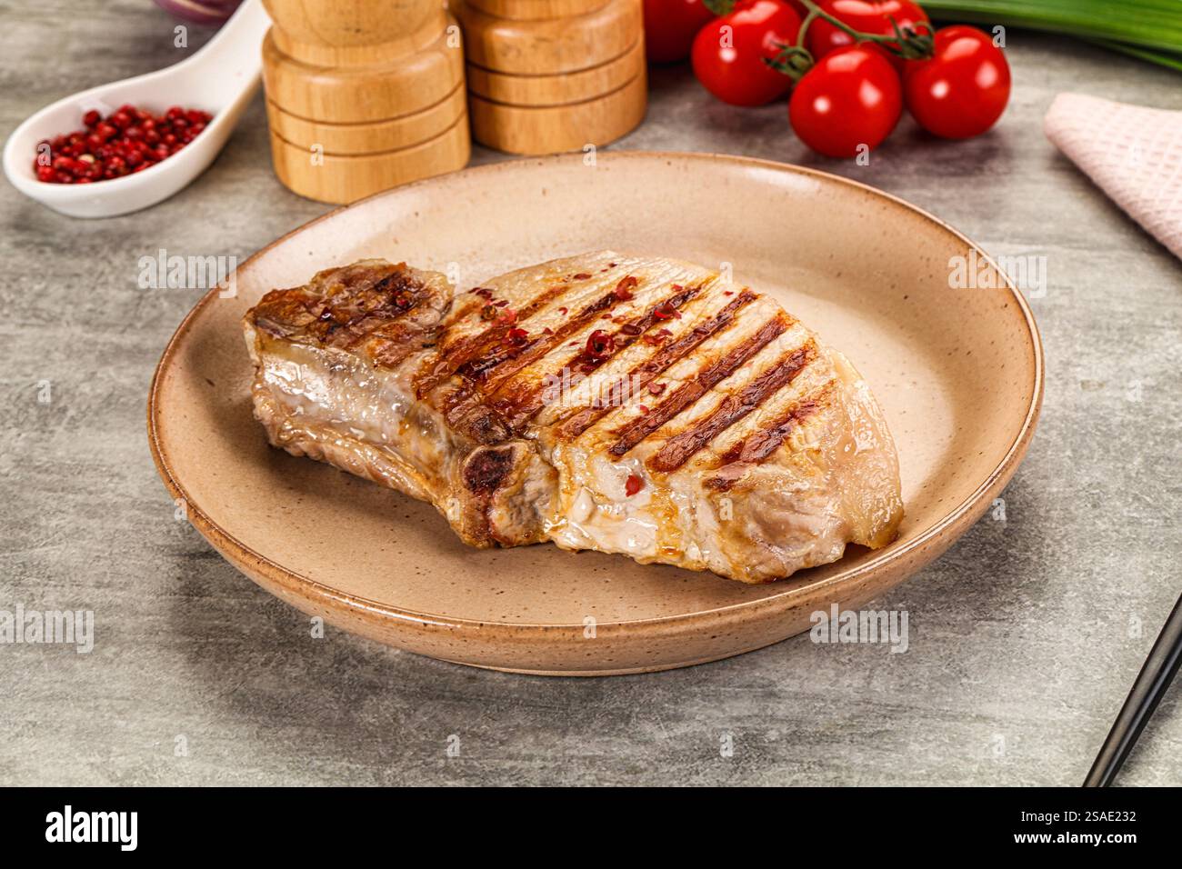 Grilled fat pork loin steak with bone Stock Photo - Alamy