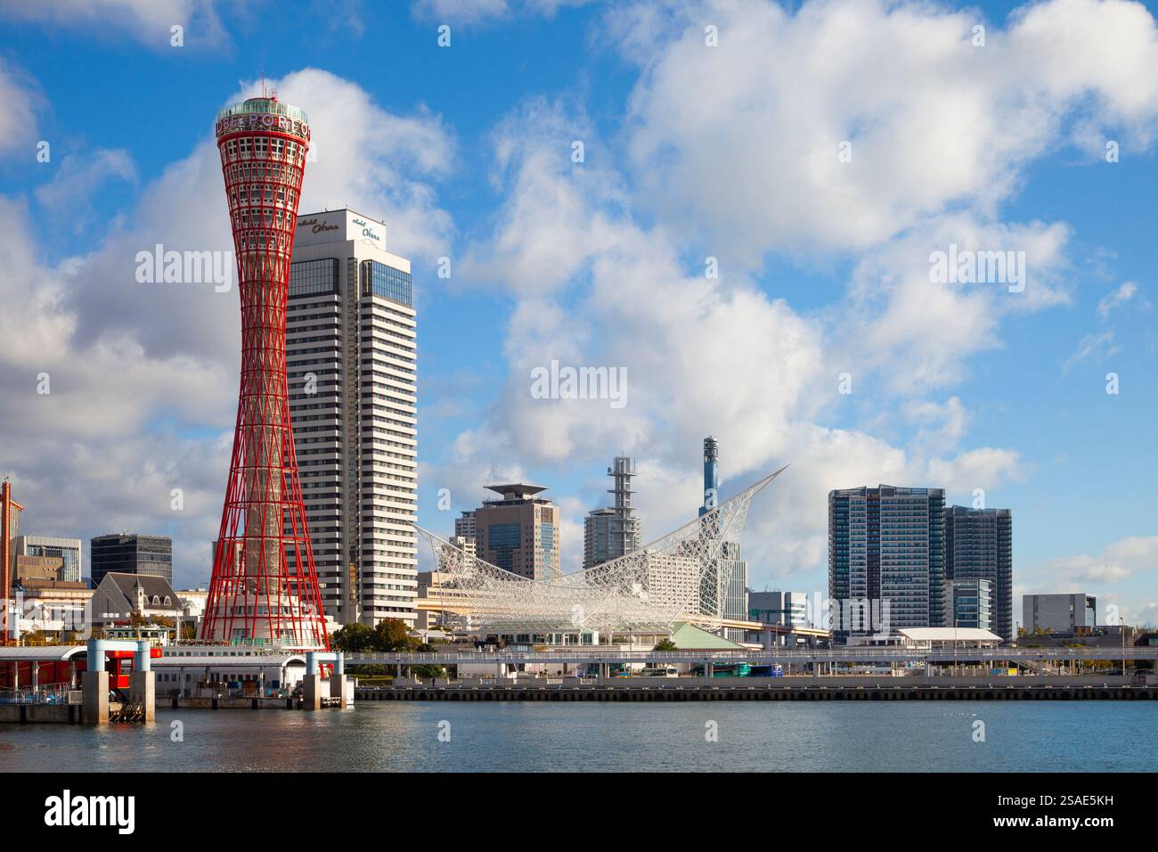 Kobe Harborland with the red Kobe Port Tower, Okura Hotel skyscraper ...