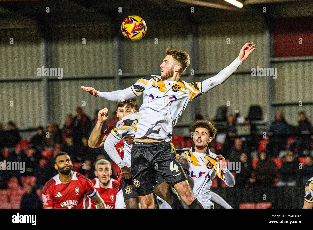 Newport County FC's Matthew Baker heads away the ball during the Sky ...