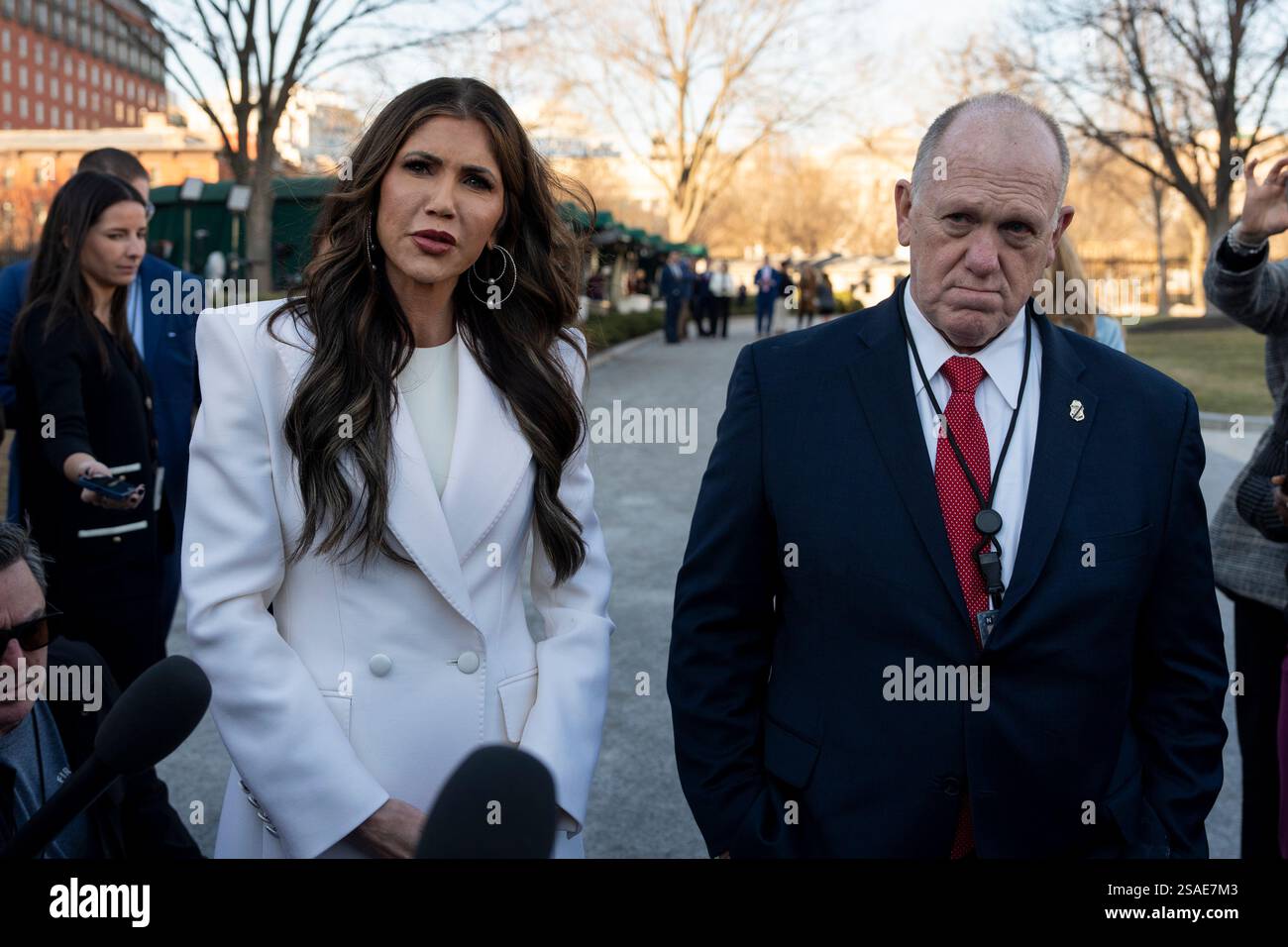 Homeland Security Secretary Kristi Noem, left, and White House border czar Tom Homan speak with ...