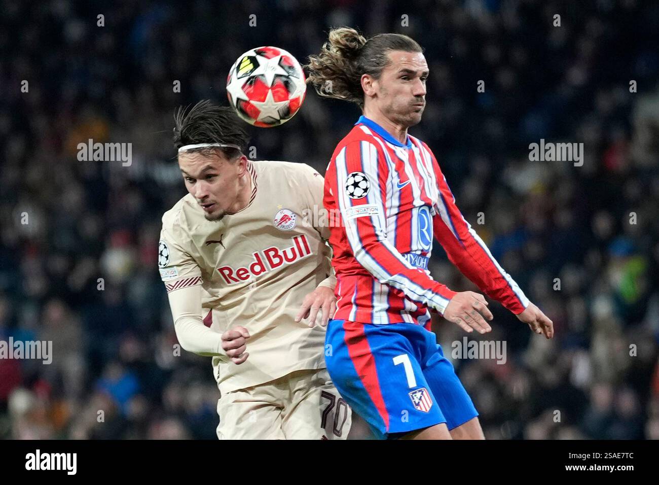 Atletico Madrid's Antoine Griezmann, right and Salzburg's Amar Dedic go ...