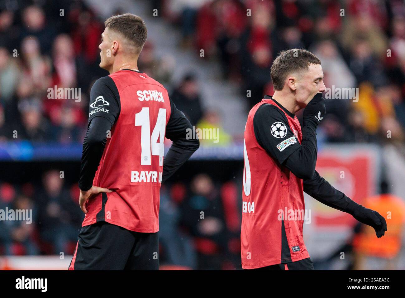 Leverkusen, Deutschland. 29th Jan, 2025. Patrik Schick (Bayer 04 Leverkusen, #14) und Florian ...