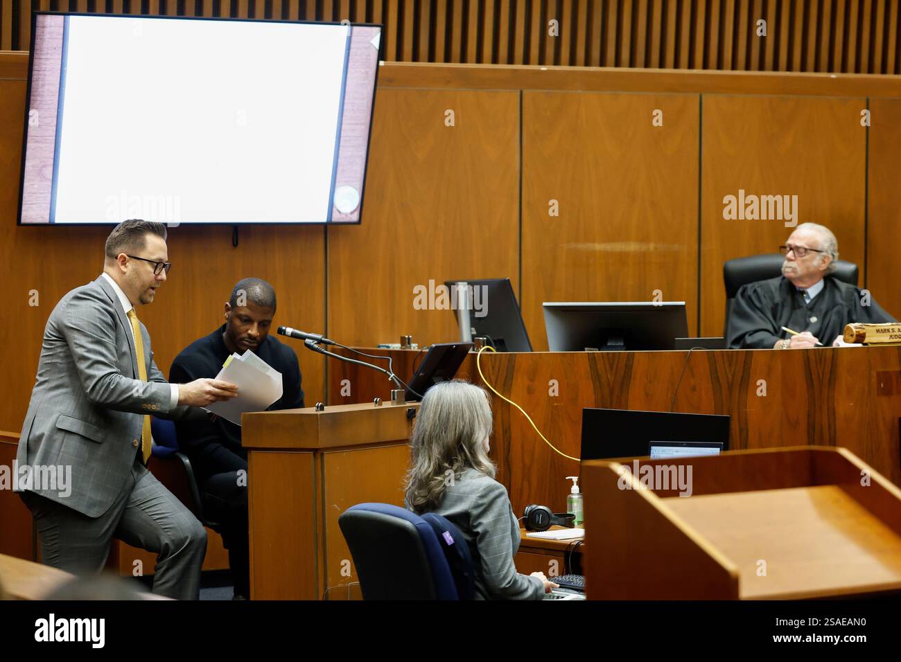 Los Angeles County Deputy District Attorney Paul Przelomiec, left ...