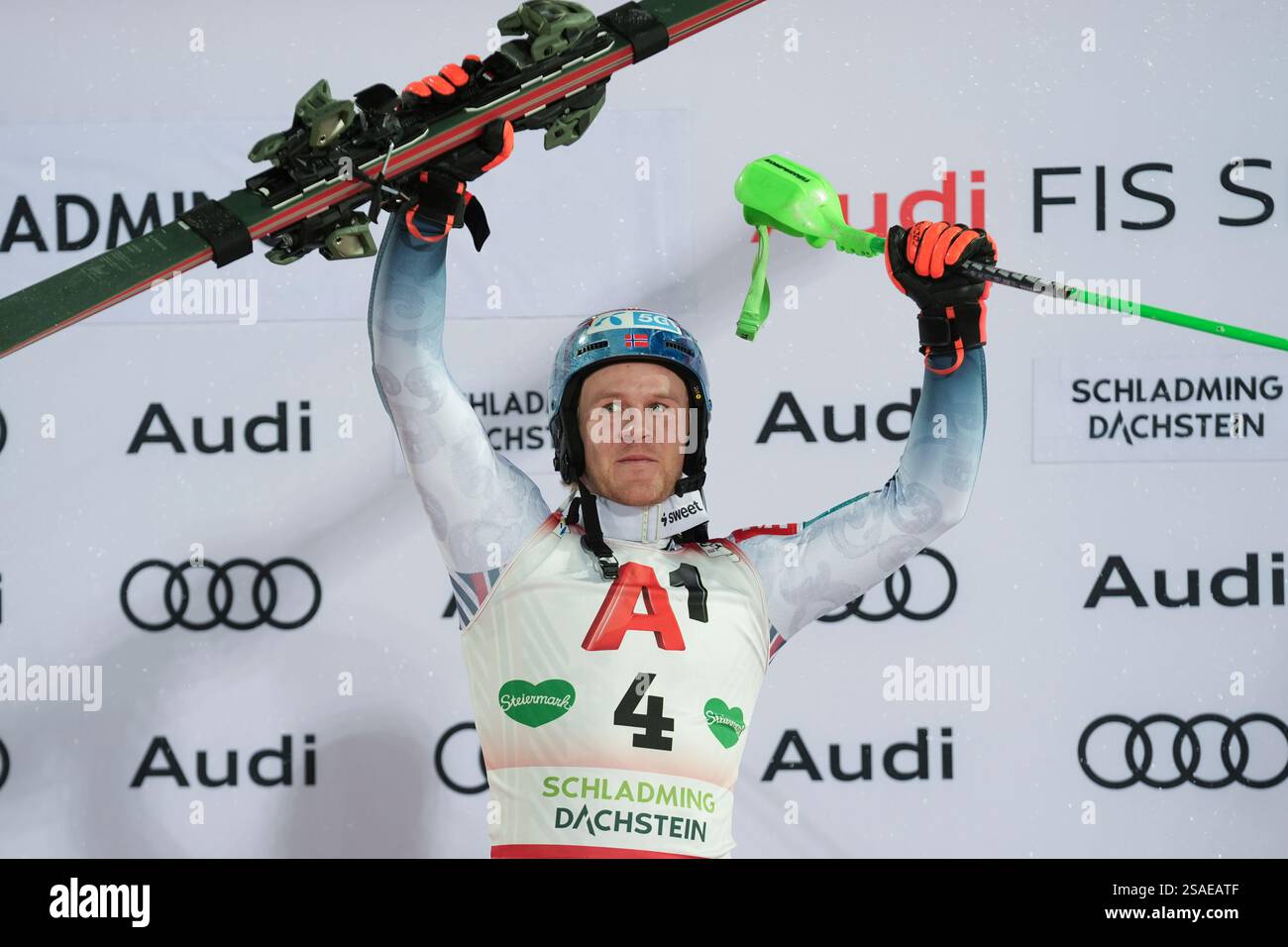 Norway's Timon Haugan celebrates on the podiumafter winning an alpine ...