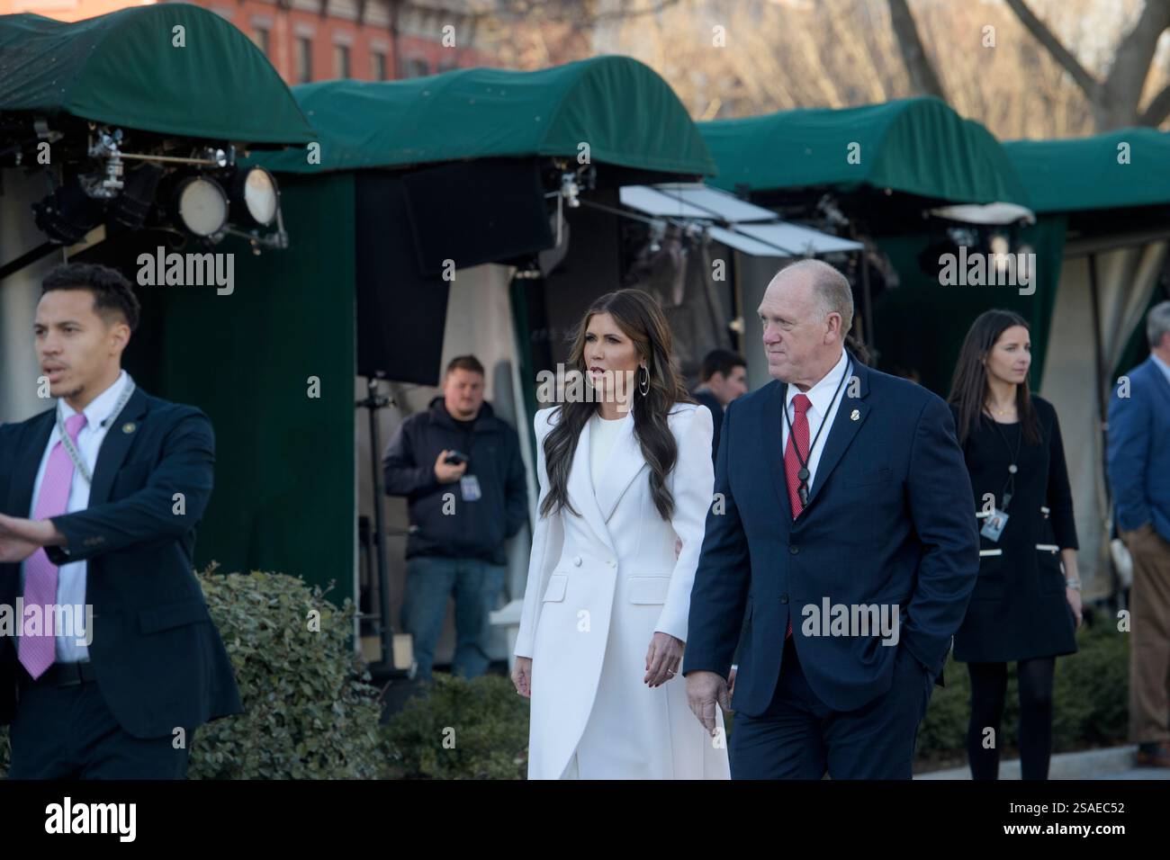 Homeland Security Secretary Kristi Noem, left, and White House border czar Tom Homan walk at the ...