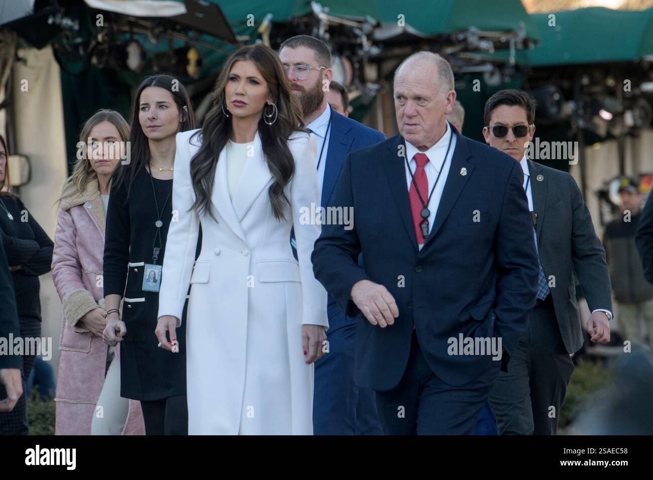 Homeland Security Secretary Kristi Noem, left, and White House border czar Tom Homan walk at the ...