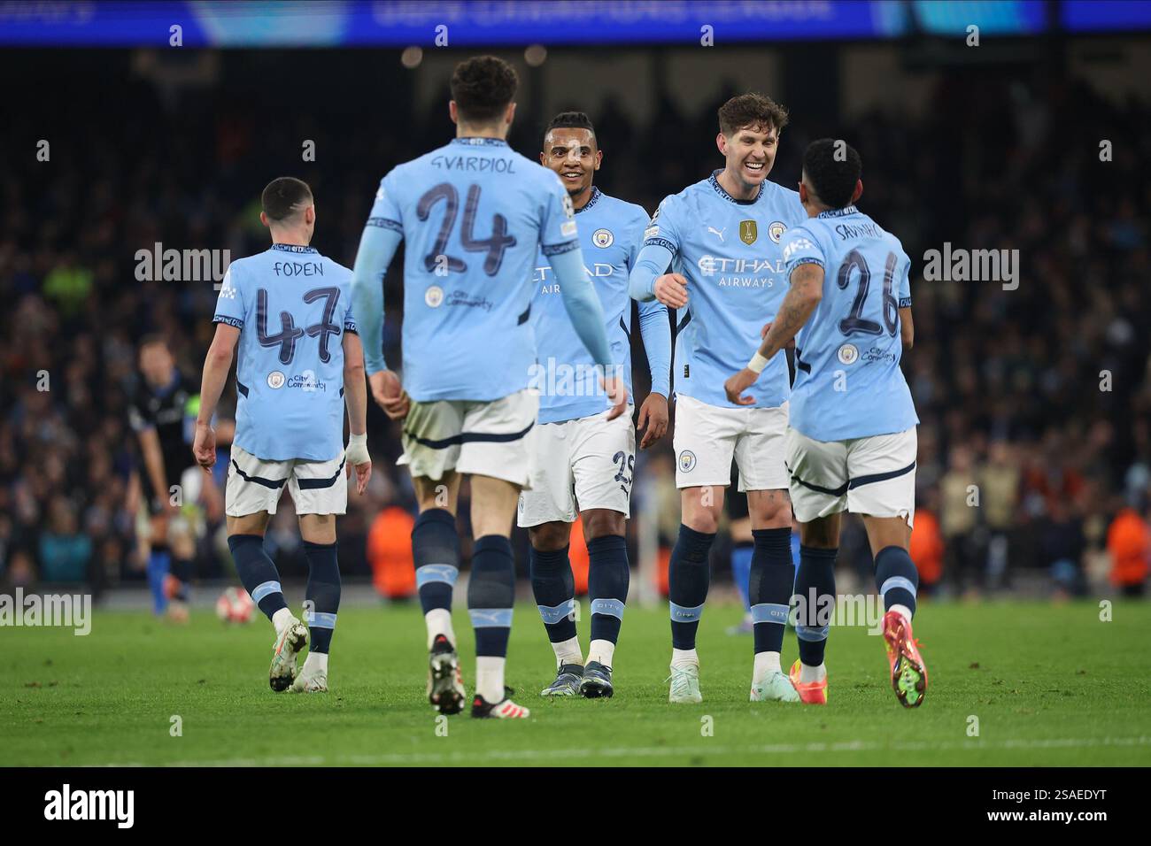 Savio (Manchester City) scores his team's third goal and celebrates ...