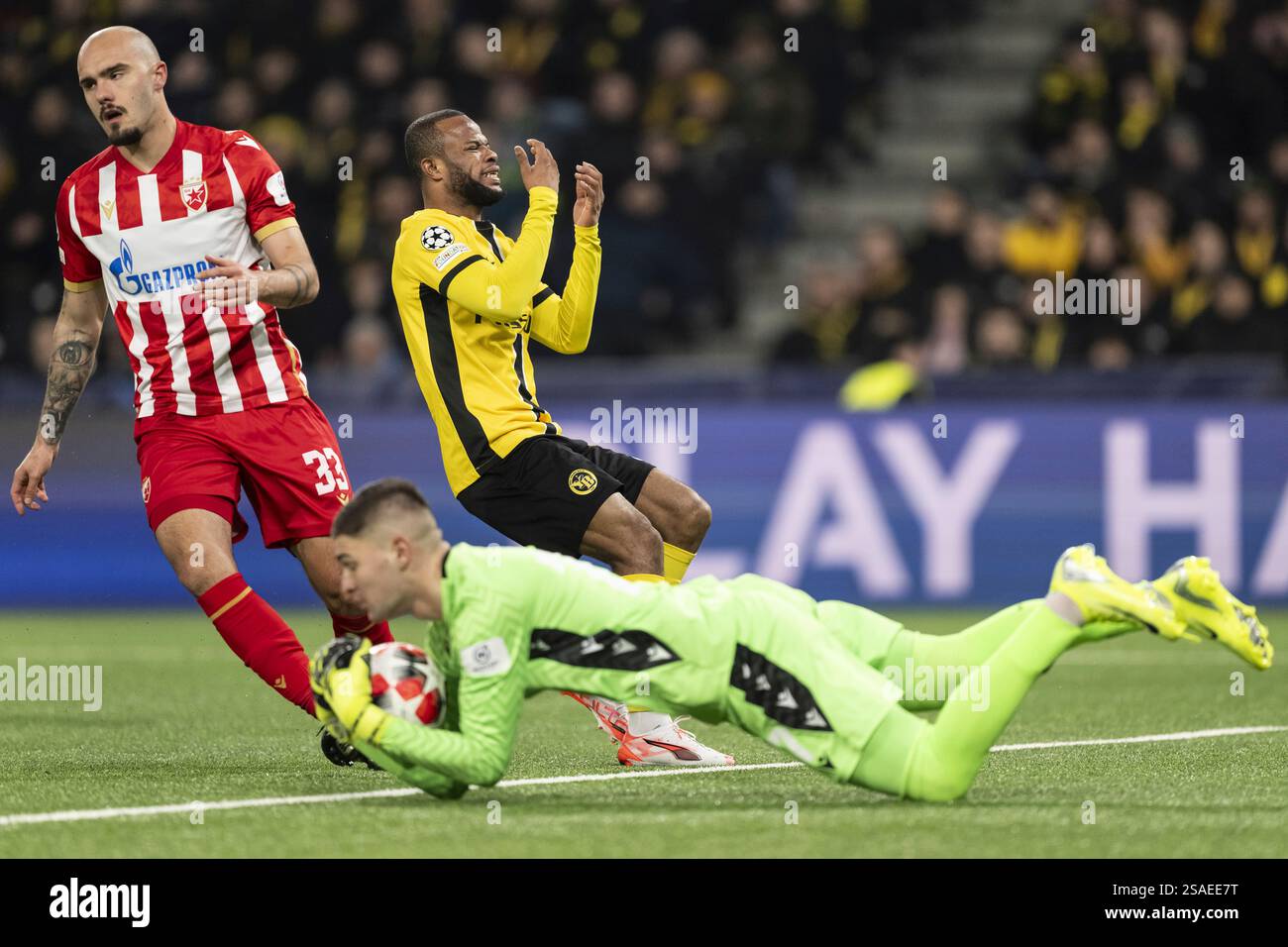 Young Boys'Meschack Elia , center, reacts after Red Star's Vanja ...