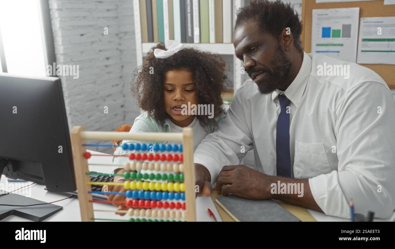 Father and daughter explore learning with an abacus in an office ...