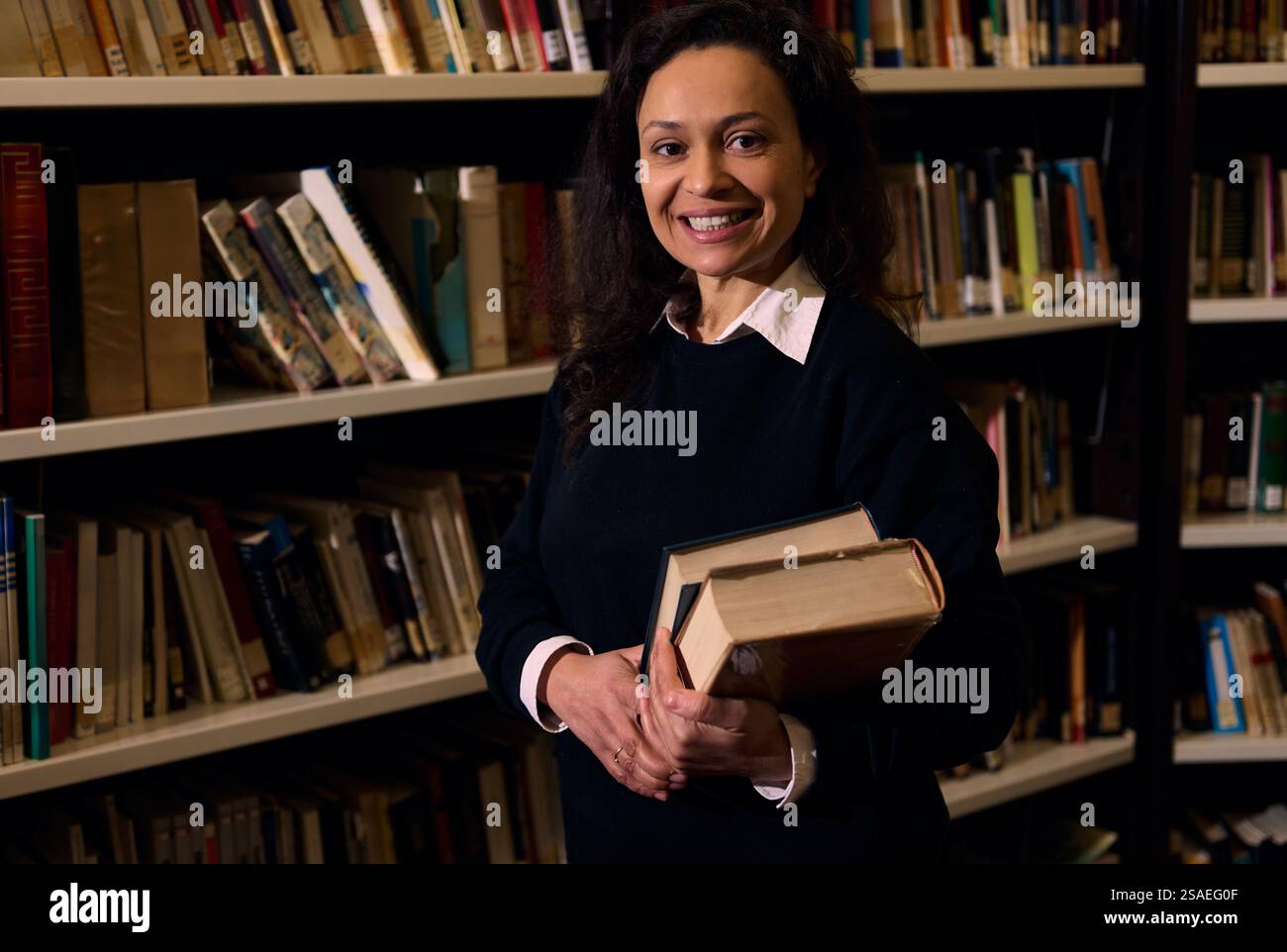 Friendly individual in a cozy library environment, emphasizing ...