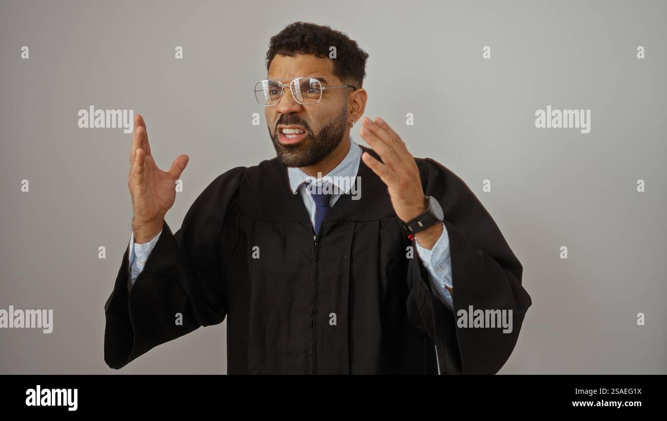 Young man in judge robe gestures passionately over isolated white ...