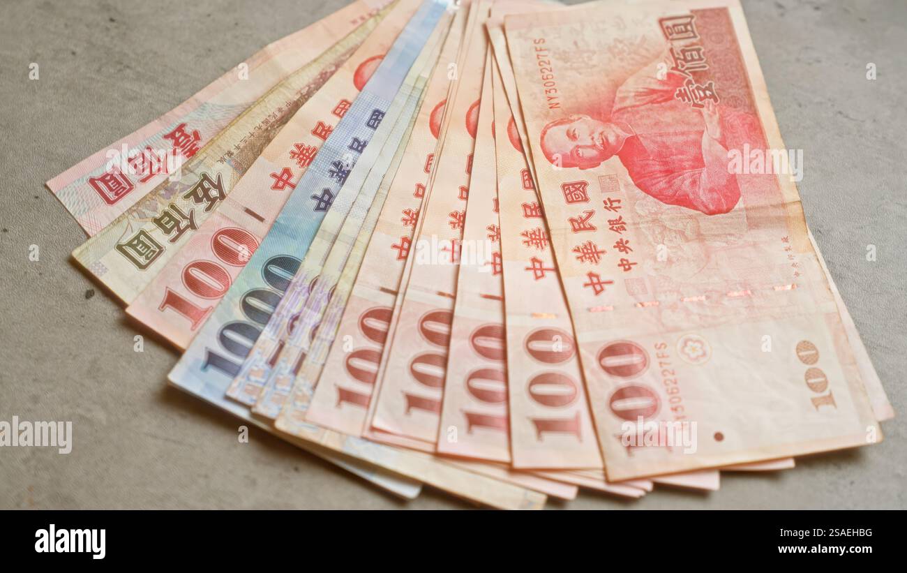 Chinese yuan banknotes spread out on concrete surface showcasing ...