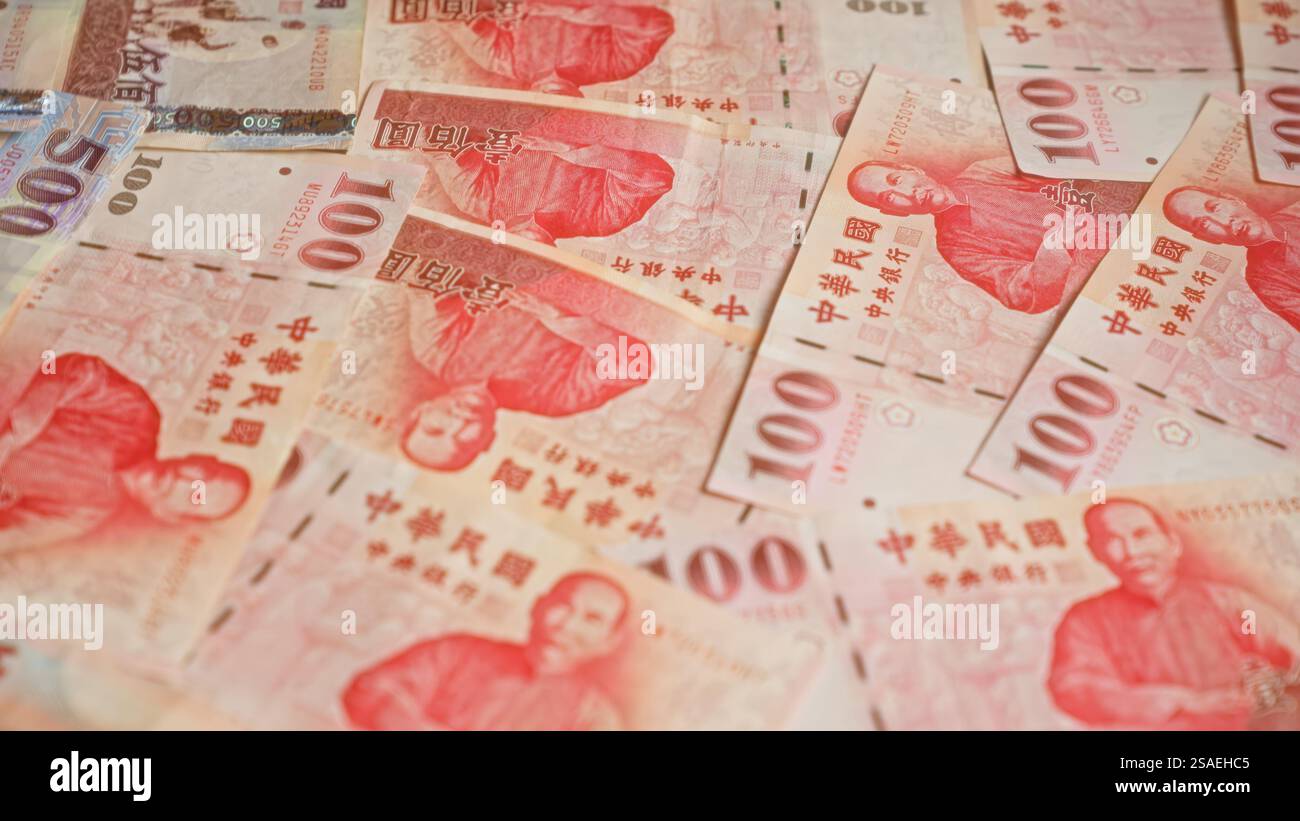 Chinese yuan banknotes spread out, showcasing various denominations and ...