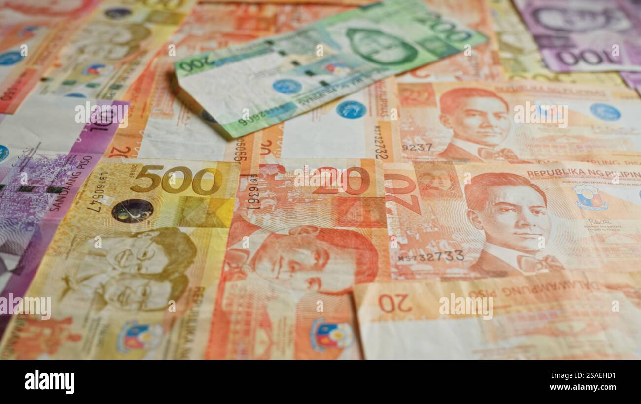 Colorful philippine pesos showcasing various denominations of banknotes ...