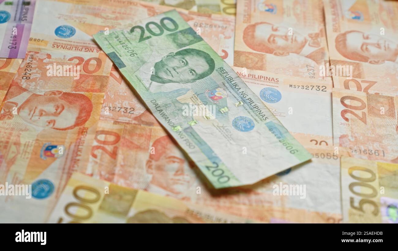 Philippine banknotes featuring multiple denominations and prominent ...