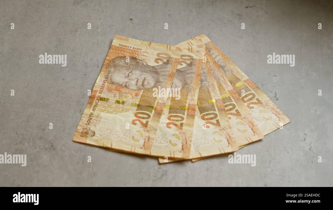South african 20 rand banknotes featuring nelson mandela arranged on a ...