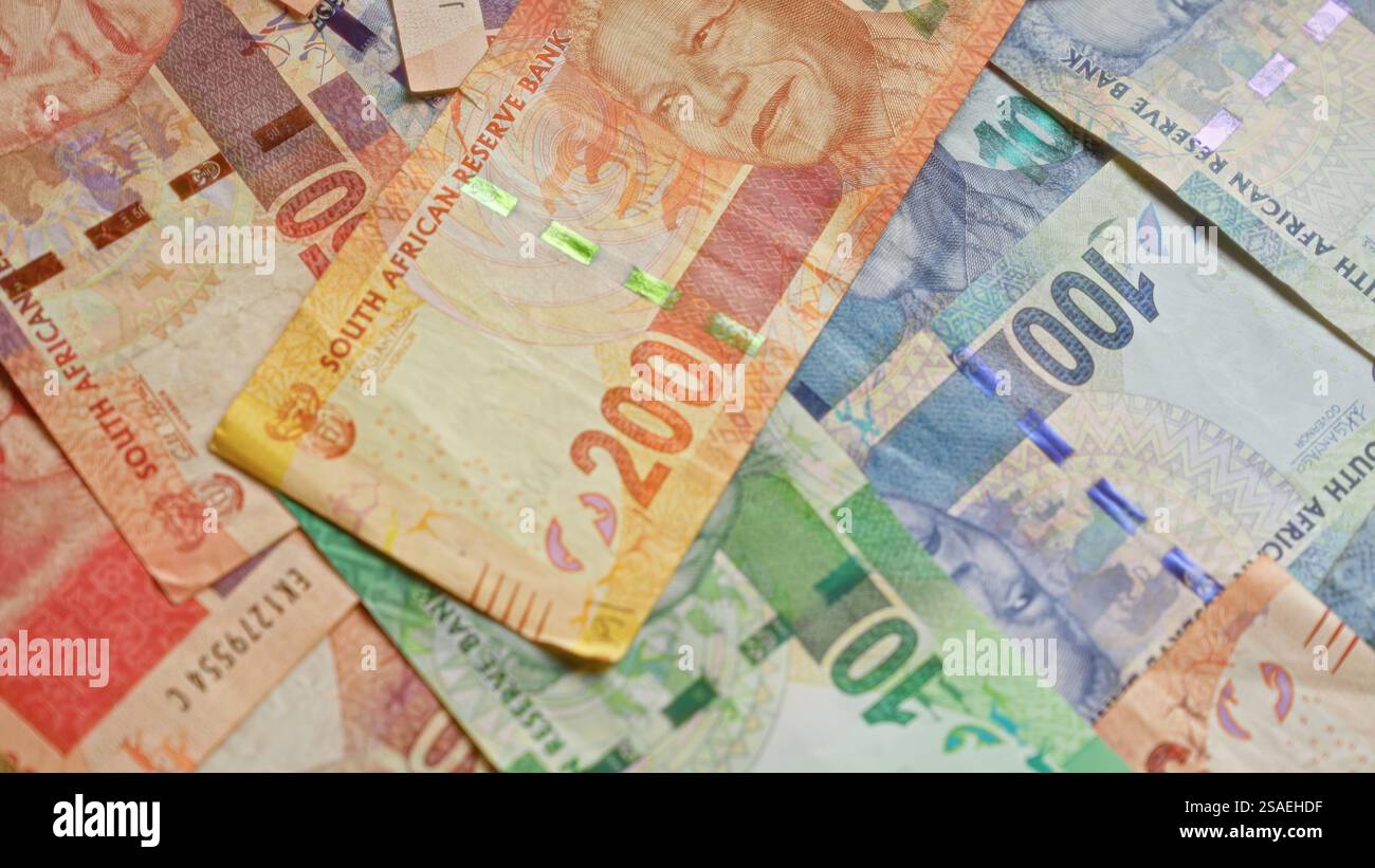 South african banknotes featuring nelson mandela spread out in a ...