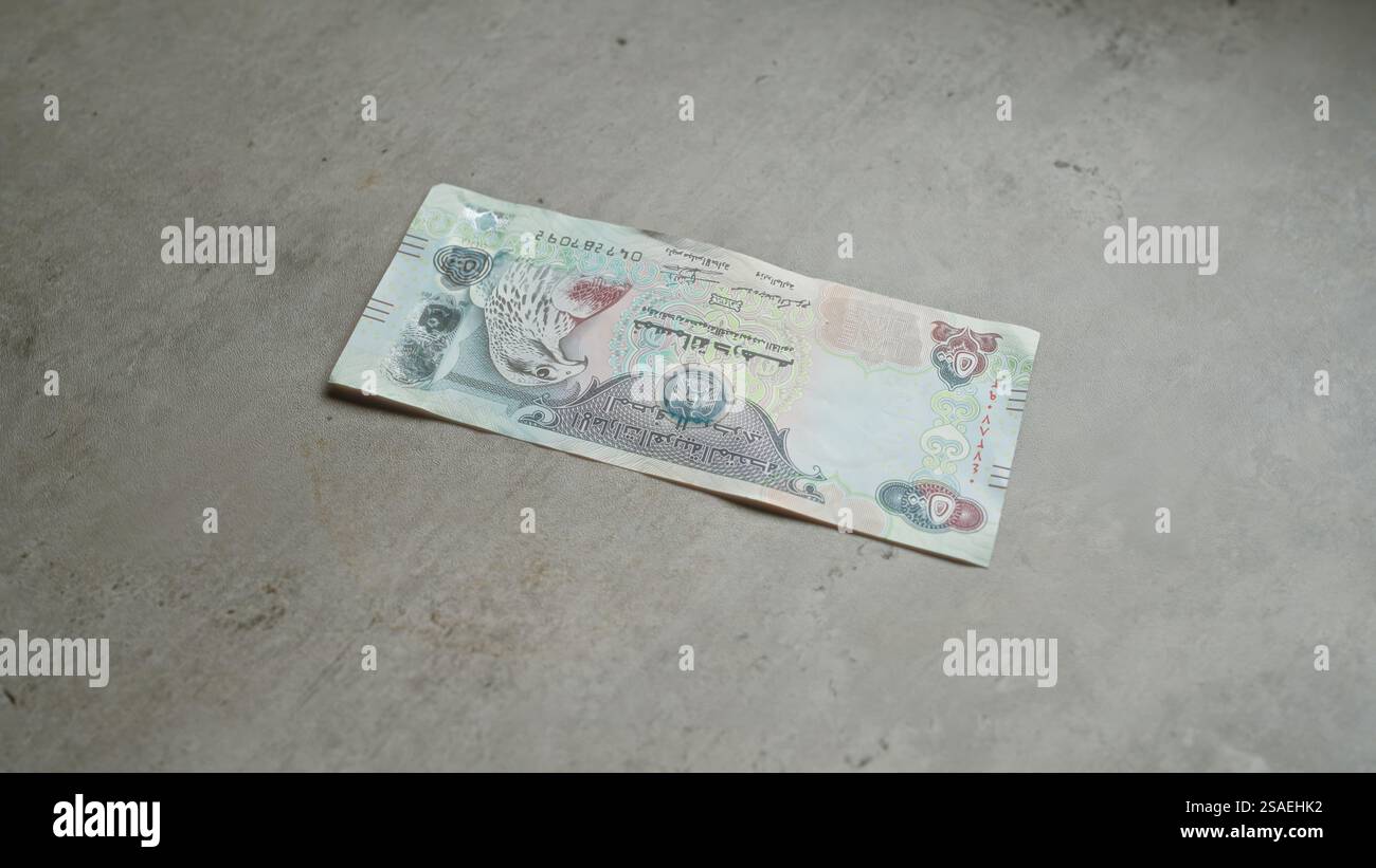 Uae banknote on a concrete surface showcases united arab emirates ...