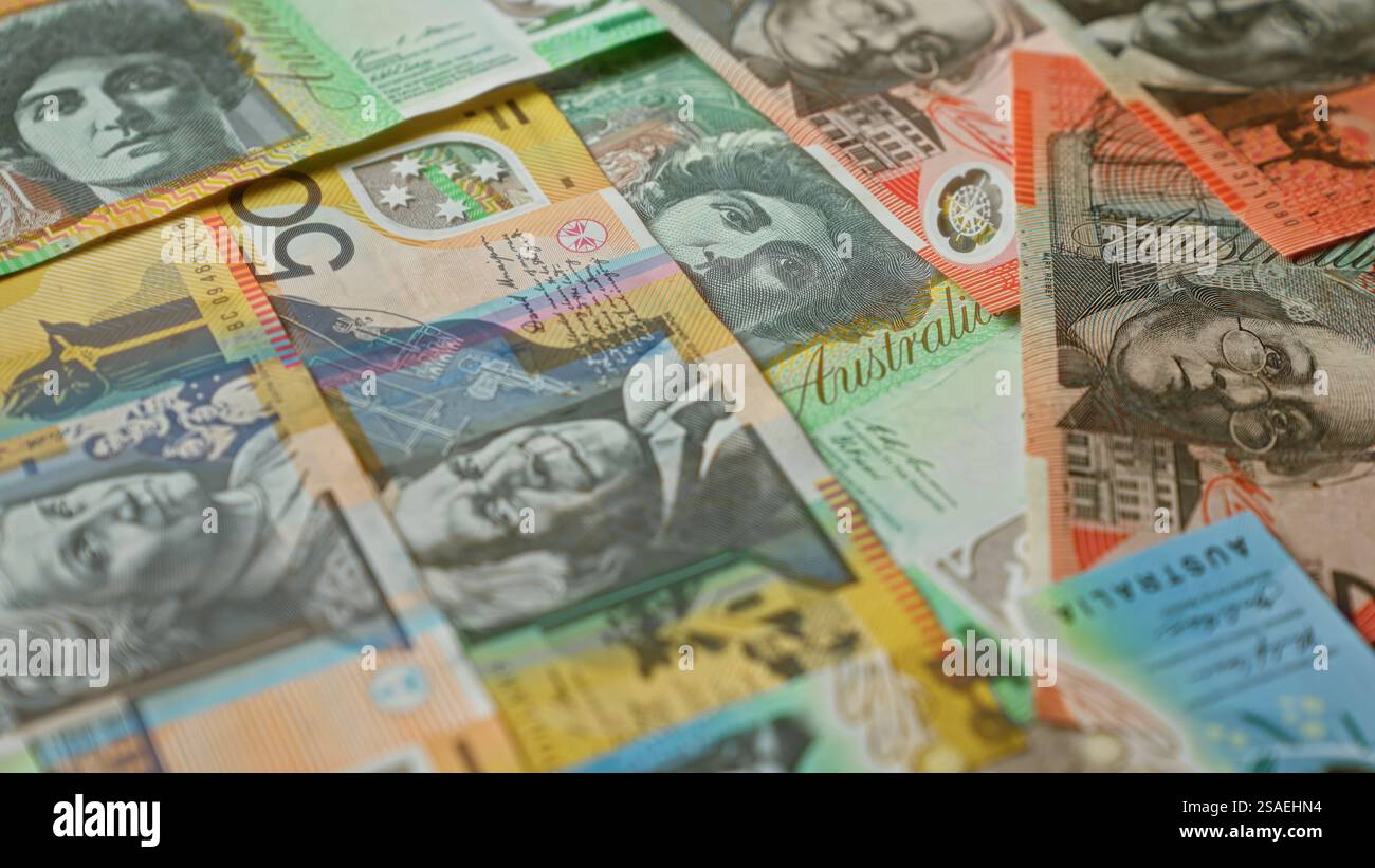 Australian banknotes in various denominations scattered, highlighting ...