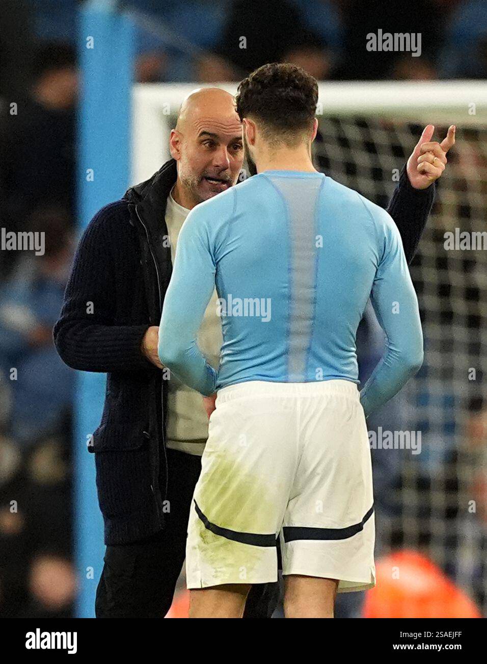 Manchester City manager Pep Guardiola speaks to his player Josko ...