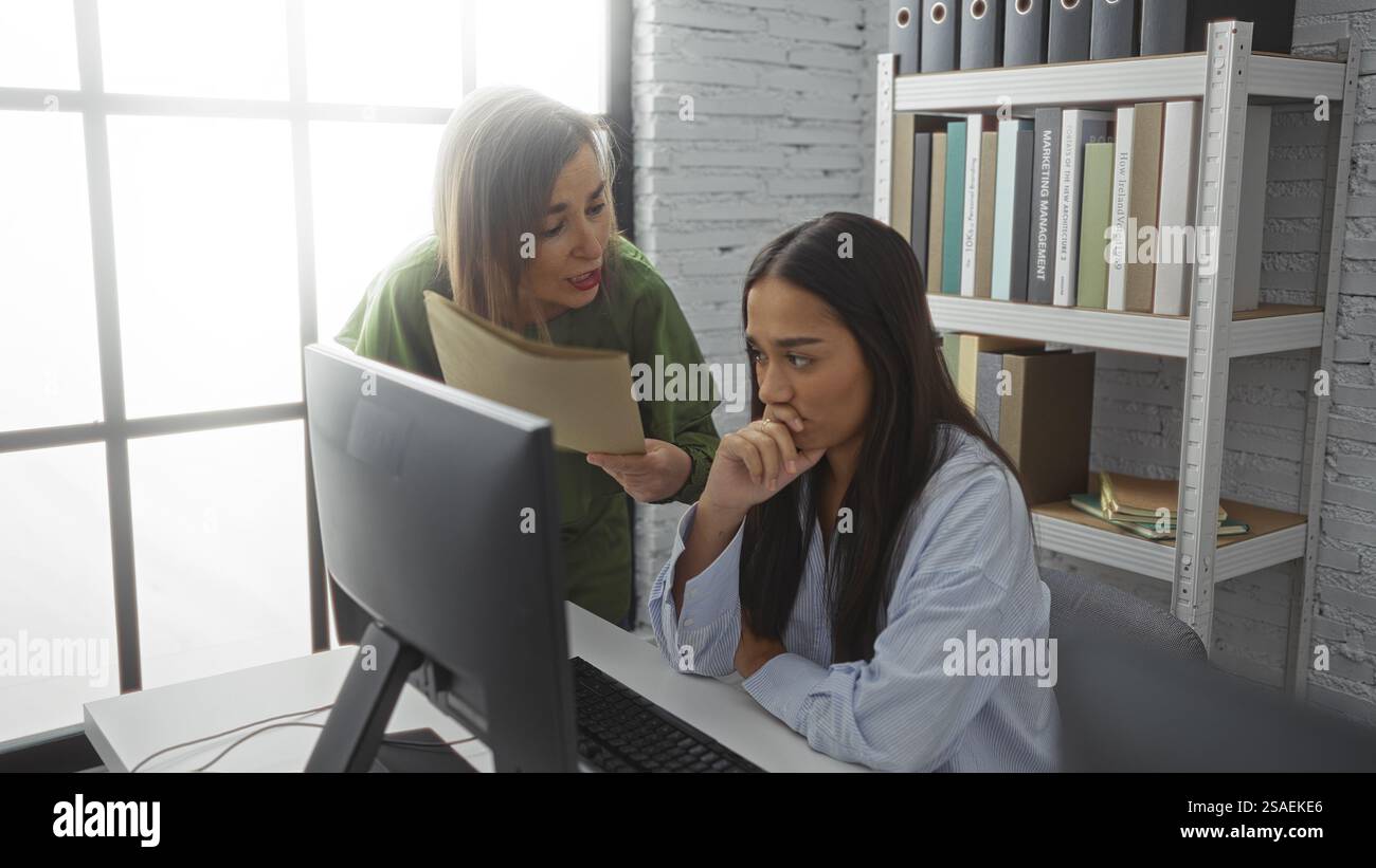 Manager scolding woman employee in office room with bookshelves and ...