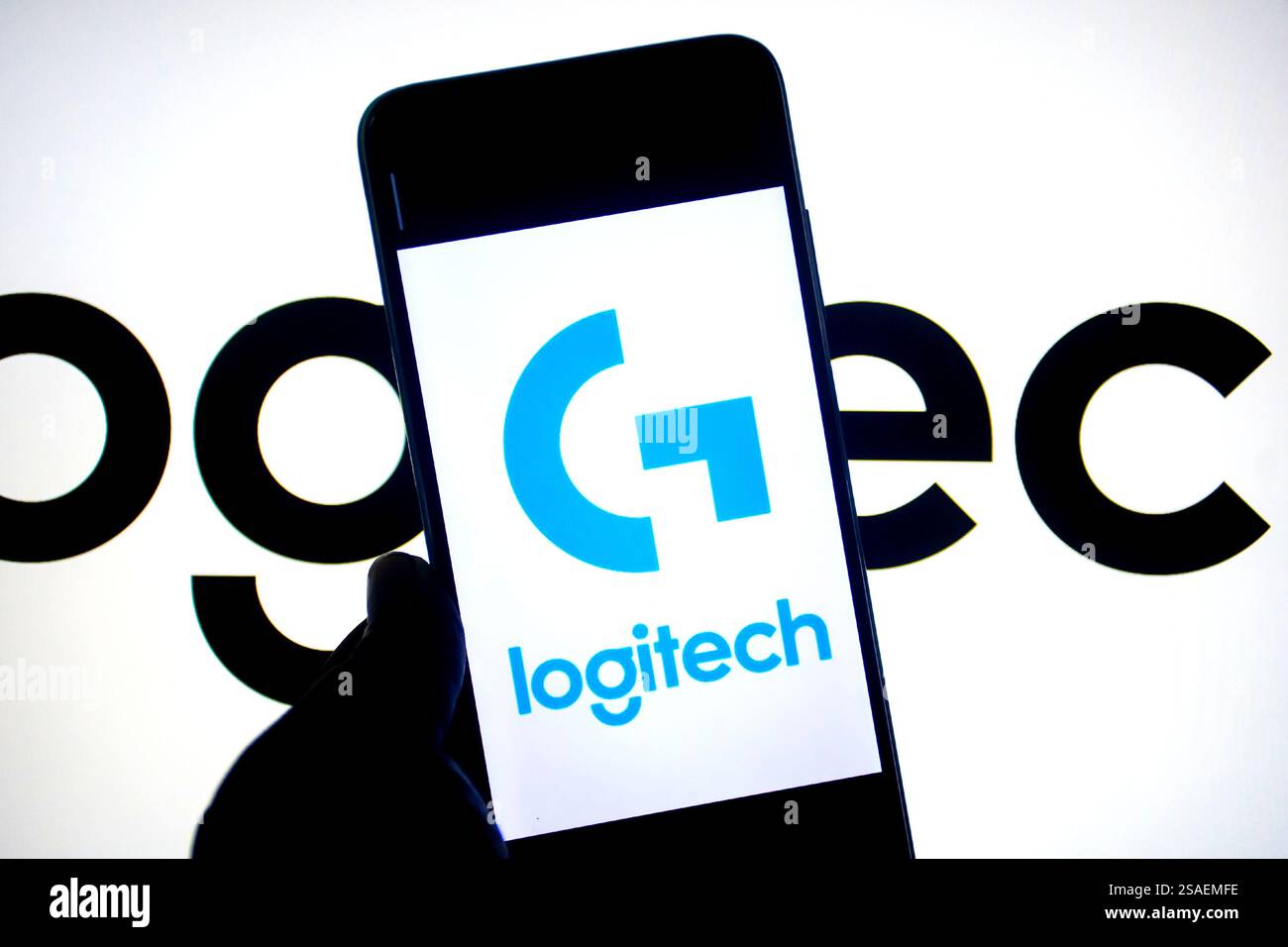In this photo illustration, a Logitech logo is seen displayed on a ...
