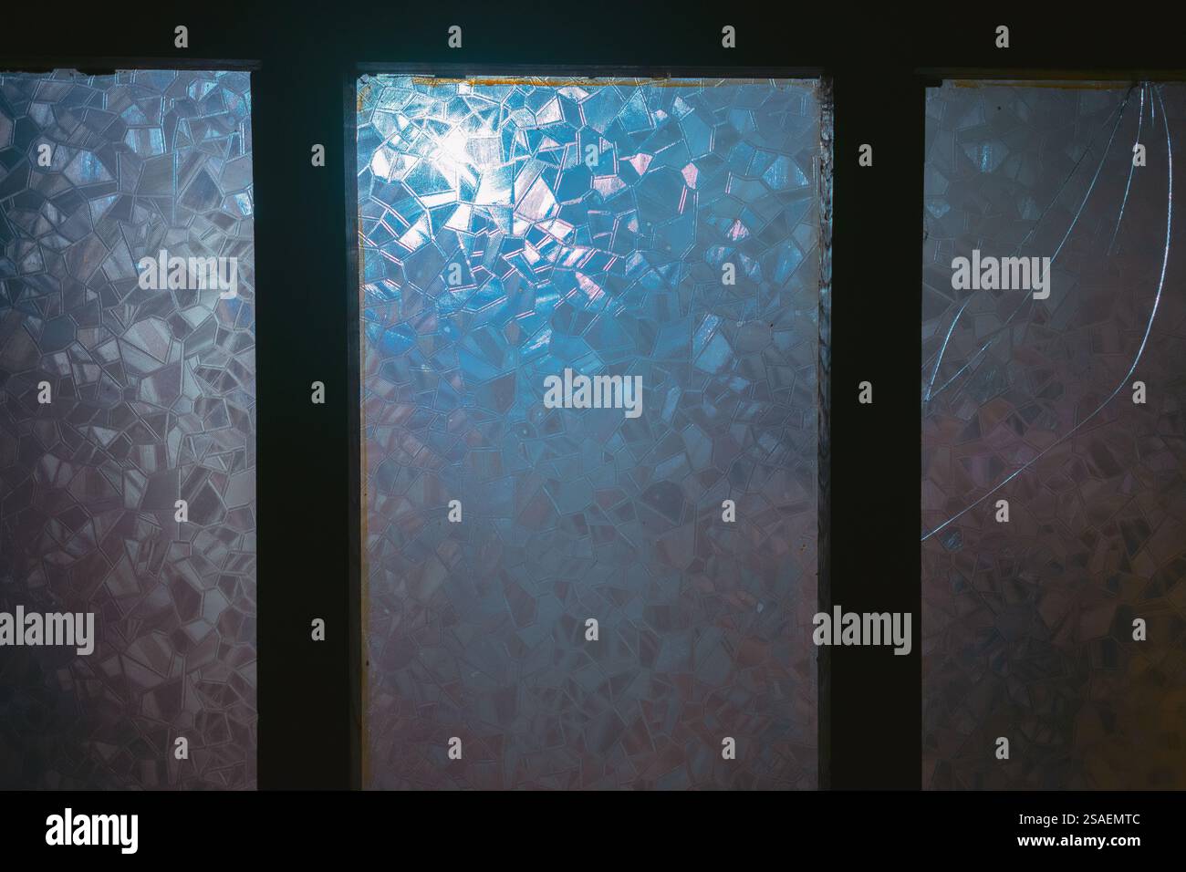 Detail of front door, old decorative cracked glass, ignition light ...