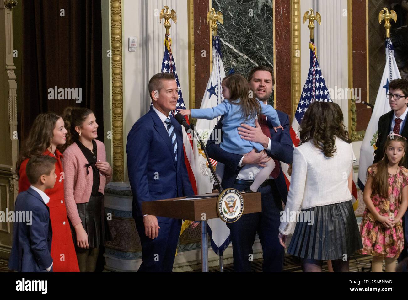 Transportation Secretary Sean Duffy, left, is joined by his family for ...