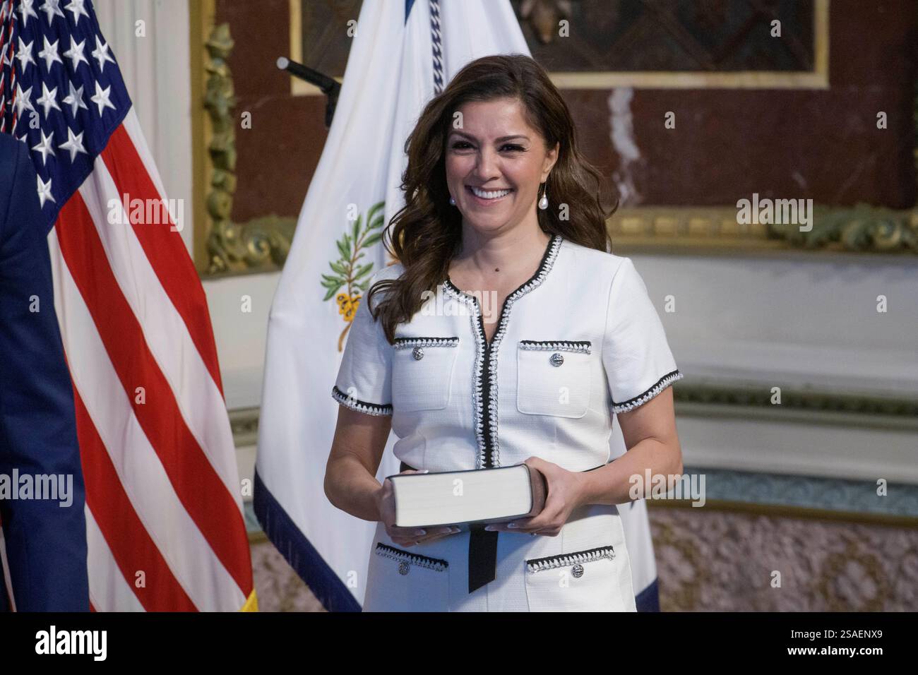 Rachel Campos-Duffy holds the Bible for her husband Sean Duffy ...