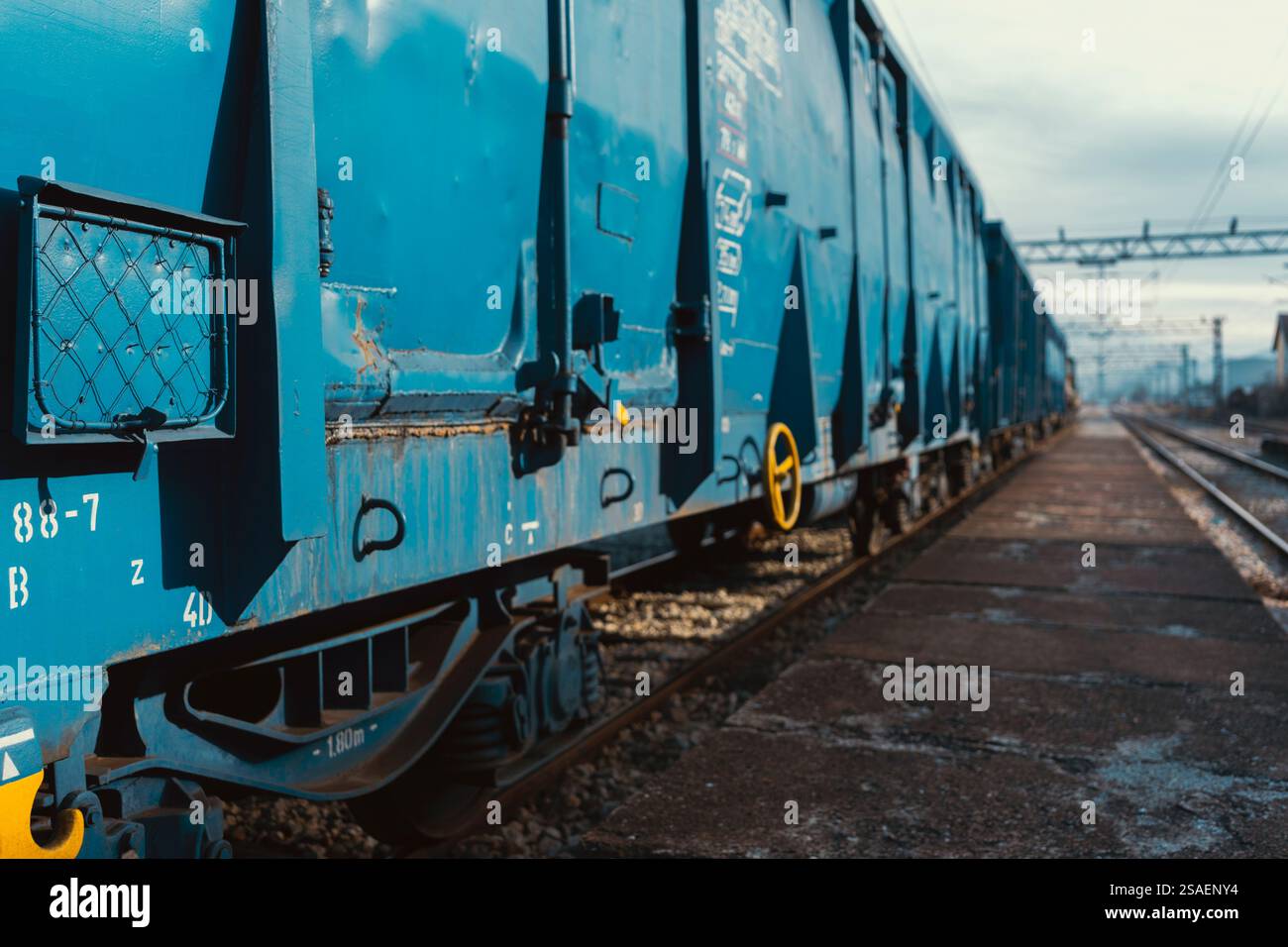 Details of a blue freight train parked in the station Stock Photo - Alamy